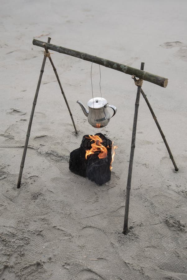 Boiling Water Kettle on Wood Campfire by Beach. Stock Photo - Image of ...