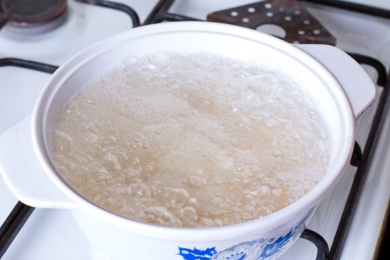 Boiling Water in Pan in Kitchen Stock Photo - Image of coffee, bowl ...