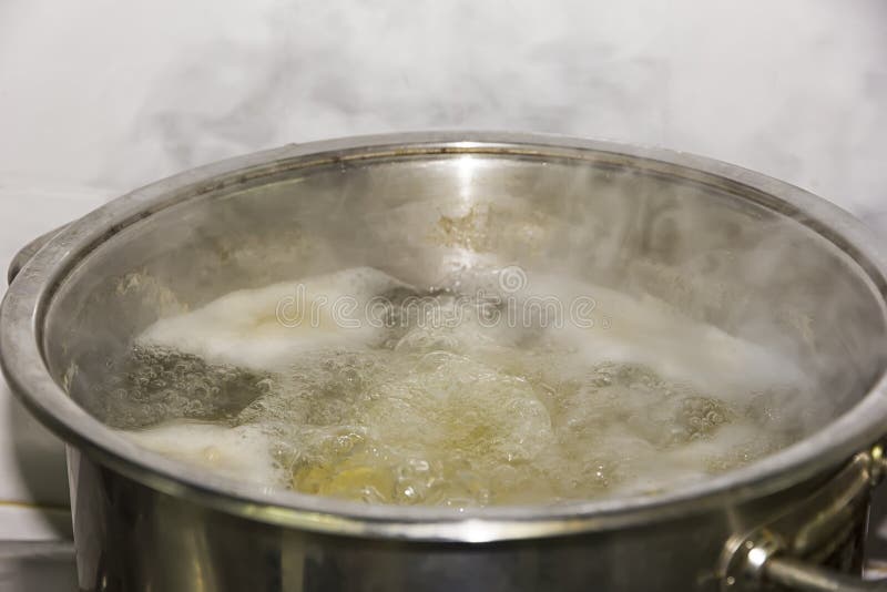 Boiling water in a pan stock photo. Image of meal, cooker - 106161894