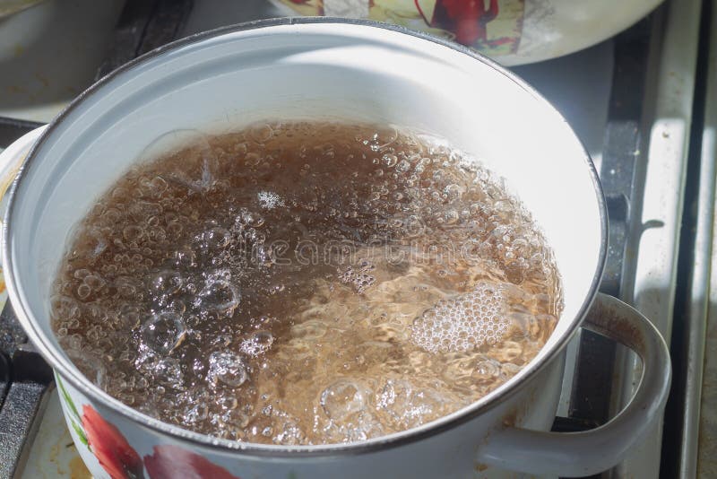 Boiling Water in a Pot on the Stove in the Kitchen Stock Image - Image ...