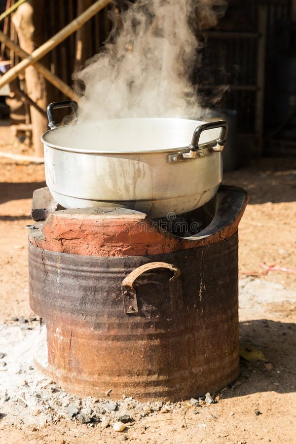 Boiling Water in Traditional Pot on Charcoal Stove Stock Photo - Image ...