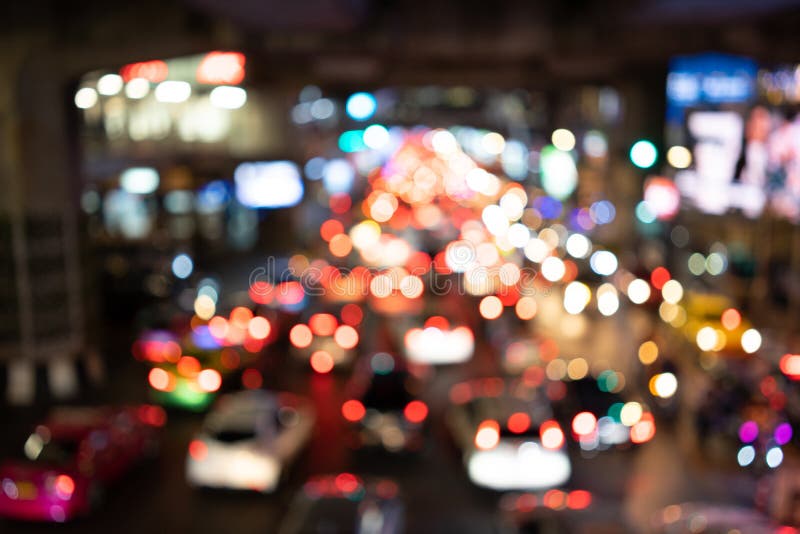 Bokeh Lights from the Car is in the Middle of the Road at Night Car ...