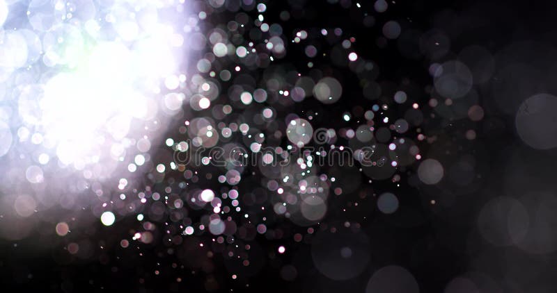 Bokeh Patterns and Glow of Bright Particles on Black Background. Stock ...