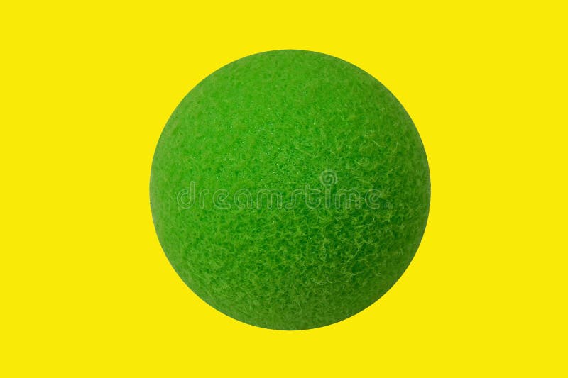 Bola Lanuda Verde En Un Fondo Amarillo Imagen de archivo - Imagen de ...