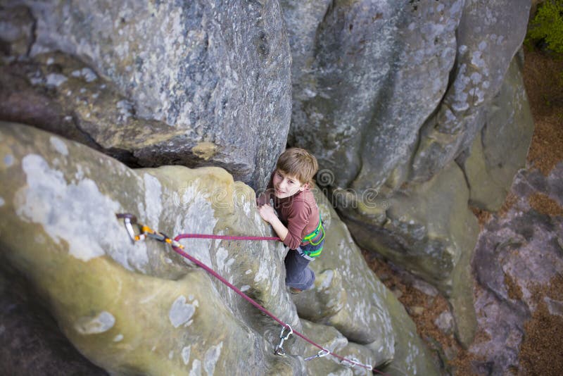 A bold child is climbing. stock photo. Image of competition - 74147478