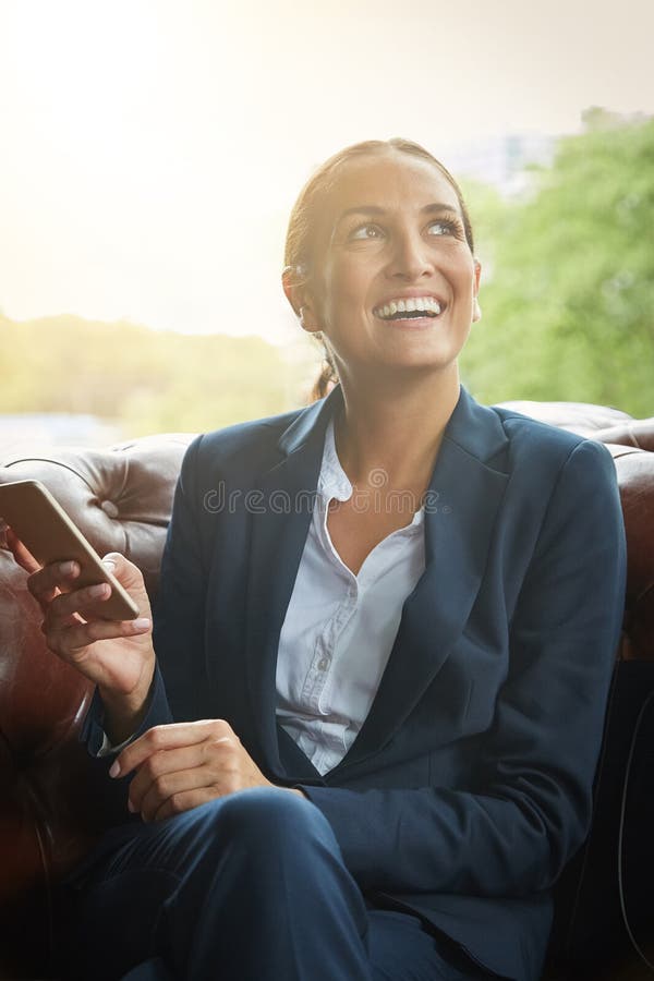 Bold and Confident. a Young Businesswoman Using a Cellphone. Stock ...