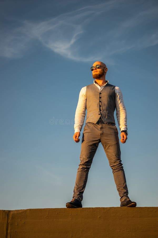 Bold Guy with a Stylish Beard and Sunglasses on a Blurred City ...