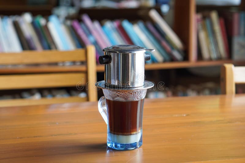 Bold and Intense Brew Slowly Dripping through a Traditional Phin Filter ...