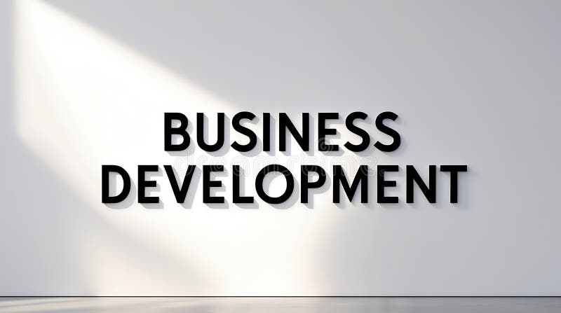 Bold Lettering for Business Development on a Smooth Wall Surface in an ...