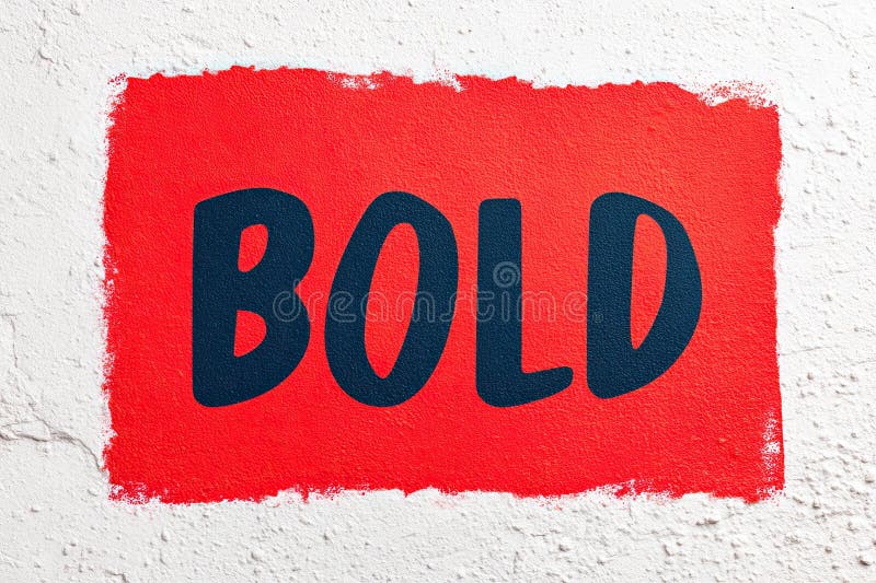 Bold Red Poster Hanging on a Textured White Wall Promoting Courage and ...