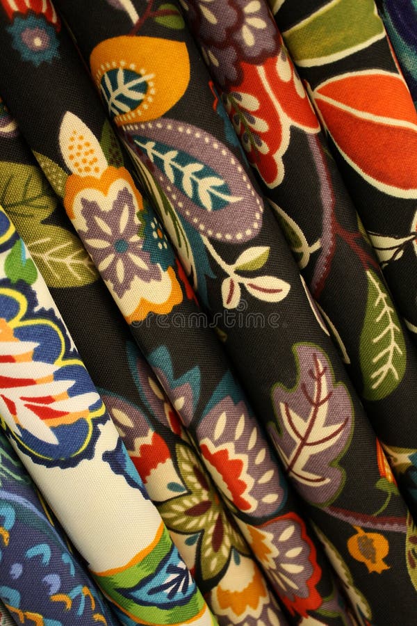 Bold and Vibrant Stylized Floral Fabric on Bolts Stock Photo - Image of ...