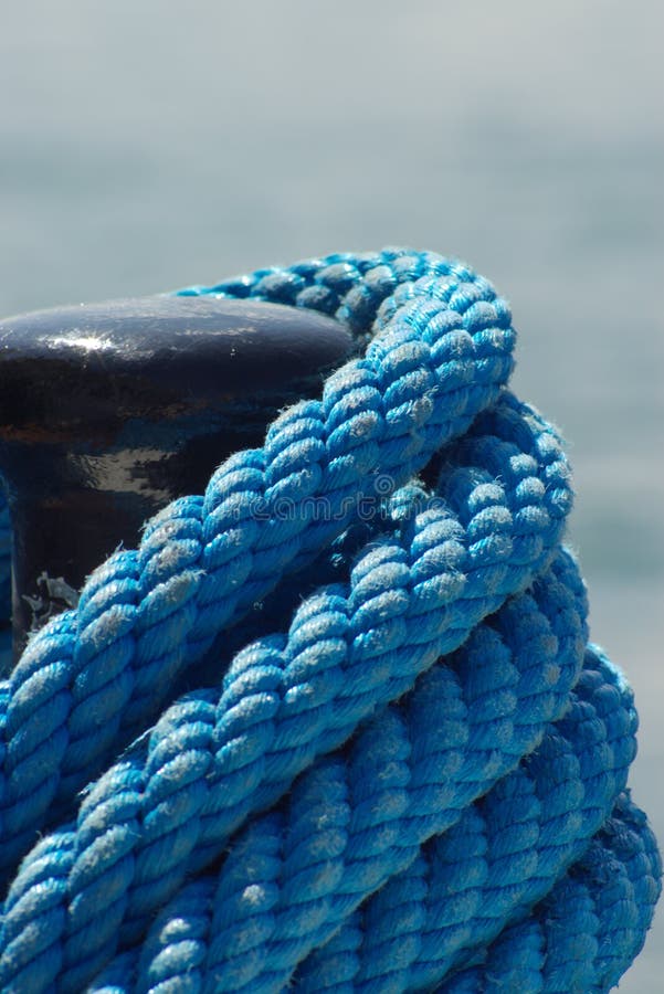 Bollard and blue rope stock image. Image of blue, rope - 2877045