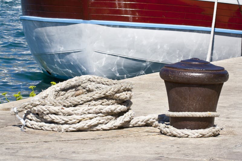 Bollard and boat stock image. Image of tourism, water - 27011615