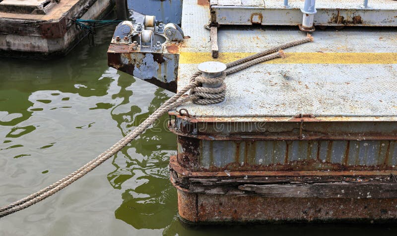 Bollard with Mooring Line on Rusty Pier Referred To a Post on a Ship or ...