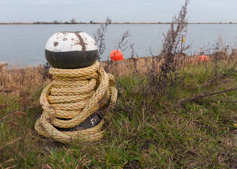 Bollard with rope stock image. Image of safe, yellow - 22847439