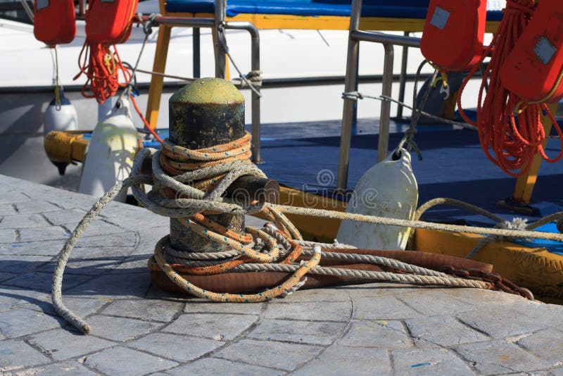 Bollard with Ropes Close-up in the Port Stock Photo - Image of anchored ...