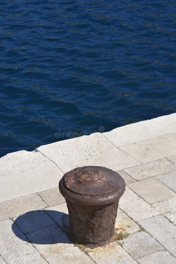 Bollard stock image. Image of coastal, corroded, brown - 309528637