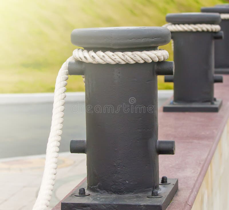 Bollards with Ropes on a Quay for Decorative Fencing Stock Image ...