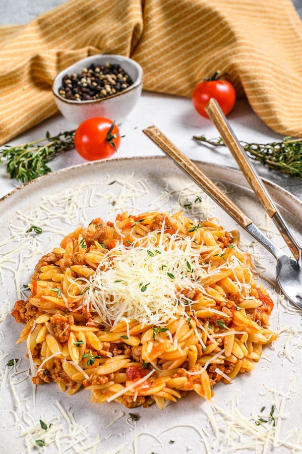 Bolognese Pasta, Risone with Ground Beef. White Background Stock Image ...