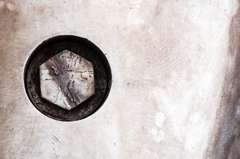 Bolt head in grunge metal stock photo. Image of industrial - 90305478