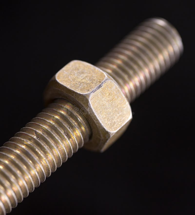 Bolt and nut close-up stock photo. Image of construction - 90559522