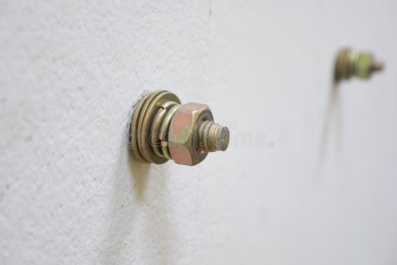 Bolt and nut on wall. stock image. Image of close, nuts - 84787191
