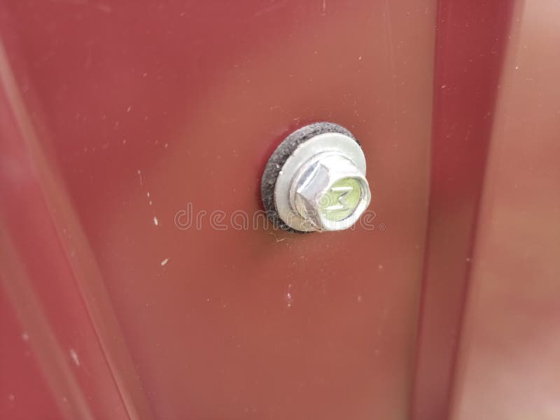 A Bolt Screwed into a Metal Corrugated Sheet Stock Image - Image of ...