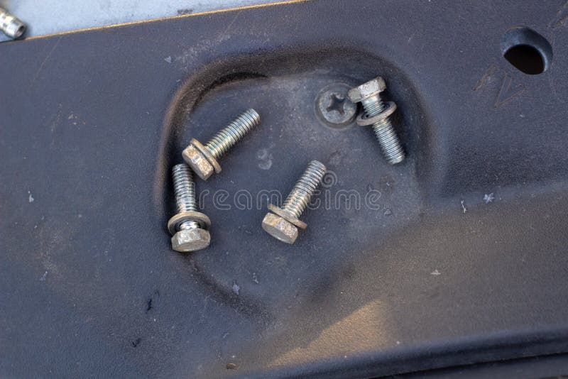 Bolts on the Panel in the Machine. Car Repair Stock Photo - Image of ...