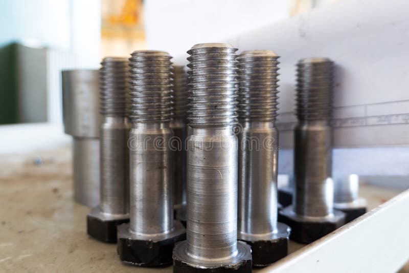 Bolts with Thread after Turning are on the Rack. Stock Photo - Image of ...