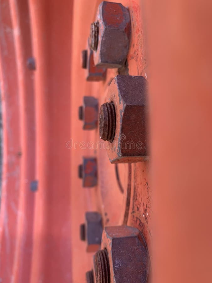 Bolts on tractor tire rim stock image. Image of white - 277345363