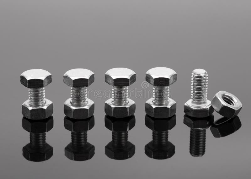 Bolts with Twisted Nuts, but One is Untwisted. Conceptual Stock Photo ...