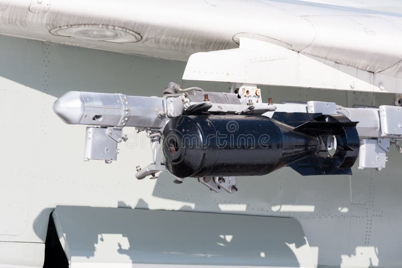 A bomb under a plane wing stock image. Image of wing - 28875419