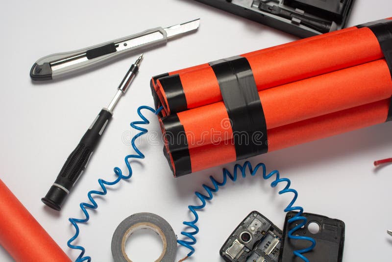 A Bomb, a Wire Tool and an Old Mobile Phone are Being Assembled on a ...
