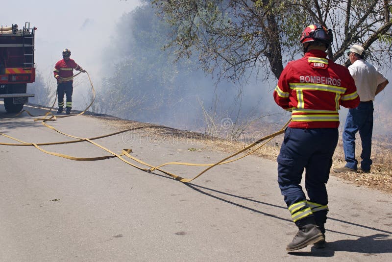 Bombeiros, Fireworker in Portugal Fighting Against the Fire Editorial ...