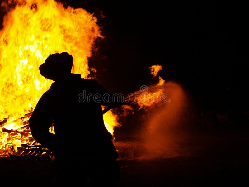 Fireman watching stock image. Image of spray, rain, fireman - 120249