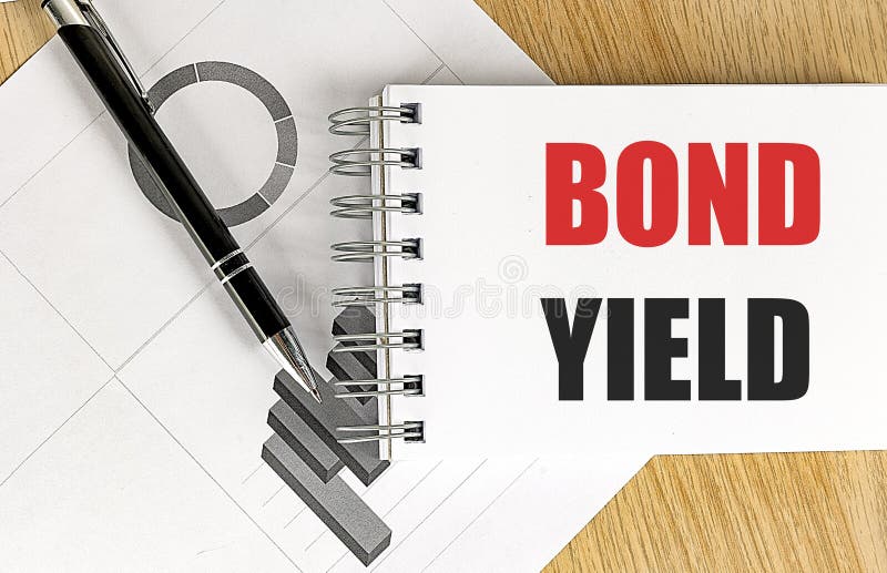BOND YIELD Text on Notebook with Chart on Wooden Background Stock Photo ...