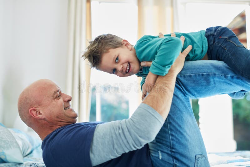 Bonding with His Boy. Cropped Shot of a Father and Son Bonding Together ...