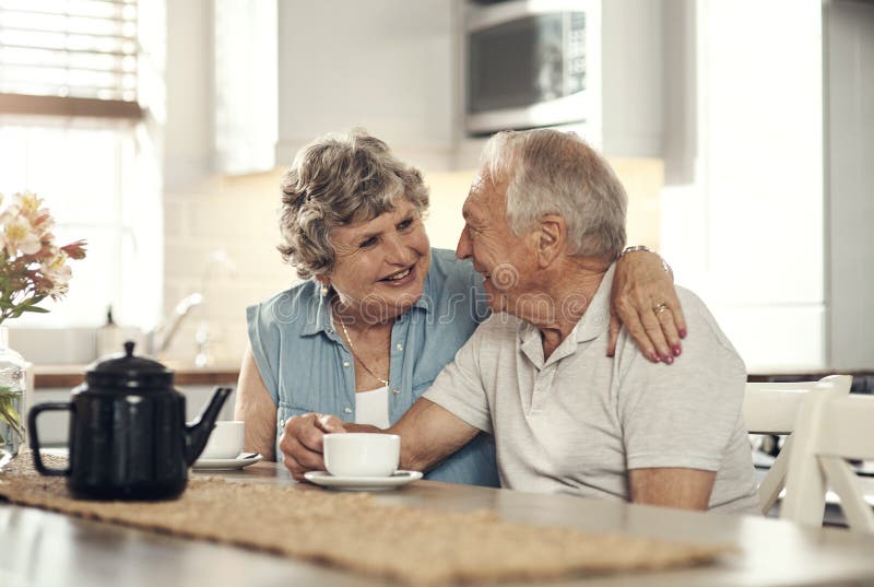 Bonding Over a Cup of Tea. Shot of a Senior Couple Having Breakfast ...