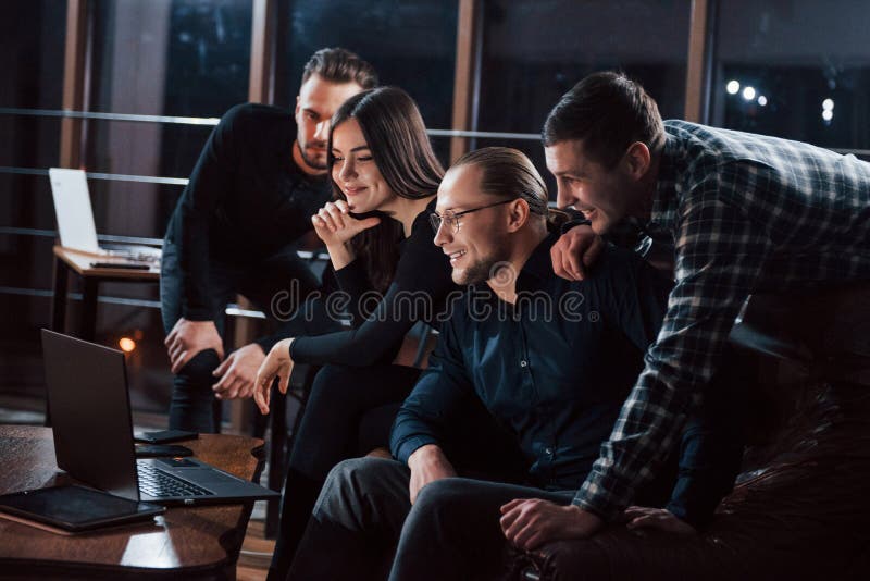 Bonding of People. Team of Young Employees Works on Their Project at ...