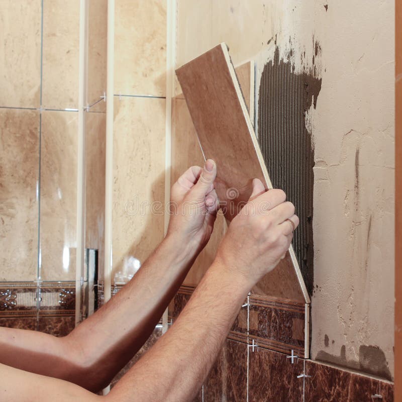 Bonding of Tiles on the Wall. Stock Photo - Image of construction ...