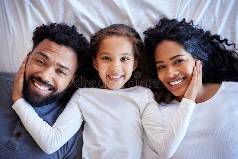 Bonding Time. a Young Family Relaxing Together at Home. Stock Photo ...