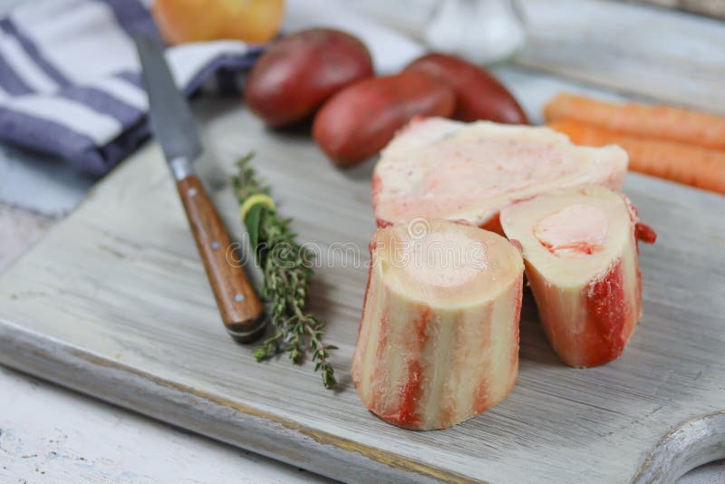 Bone marrow and vegetables stock photo. Image of cuisine - 176251644