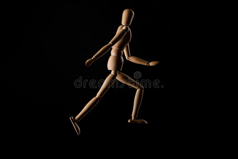 Boneca De Madeira Imitando Correndo Foto de Stock - Imagem de funcionar ...