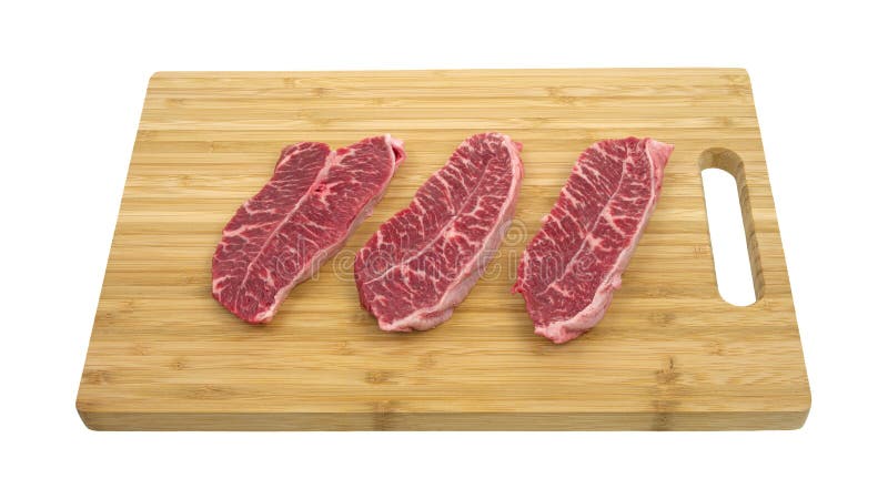 Boneless Top Blade Steak on Cutting Board Stock Image - Image of ...