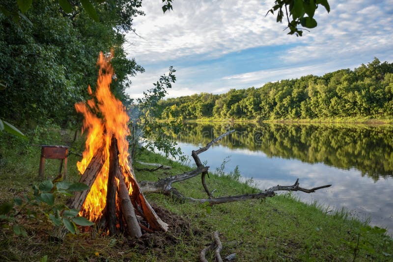 Bonfire On The Background Of The Starry Sky And Night City Stock Image ...