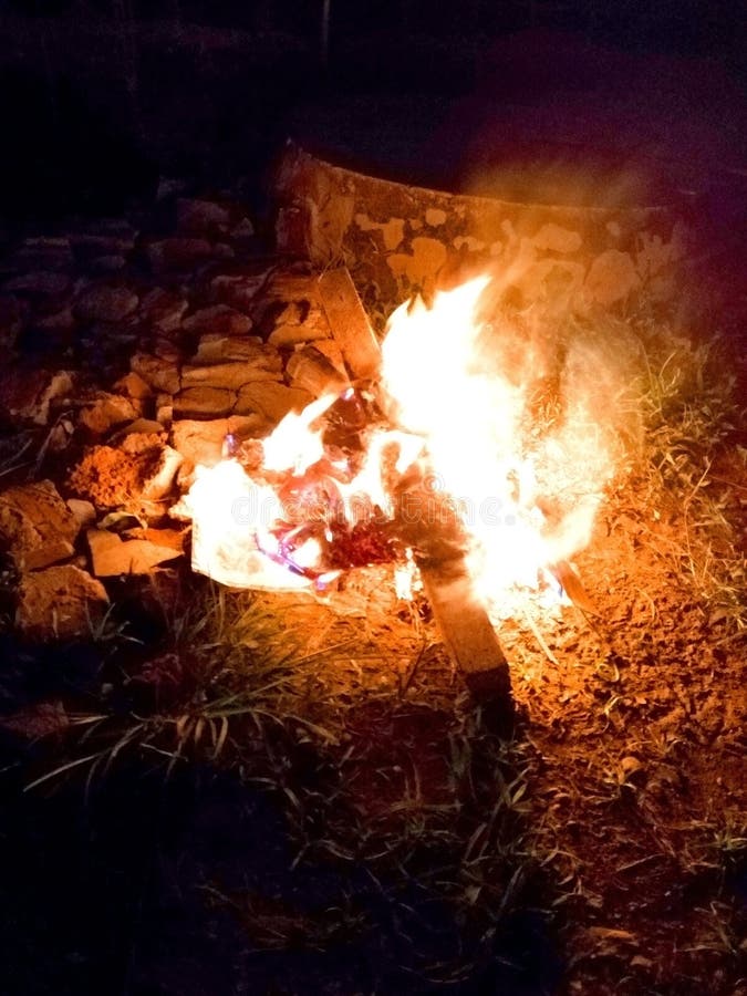 Bonfire in Backyard between Rocks and Grass in Night Stock Photo ...