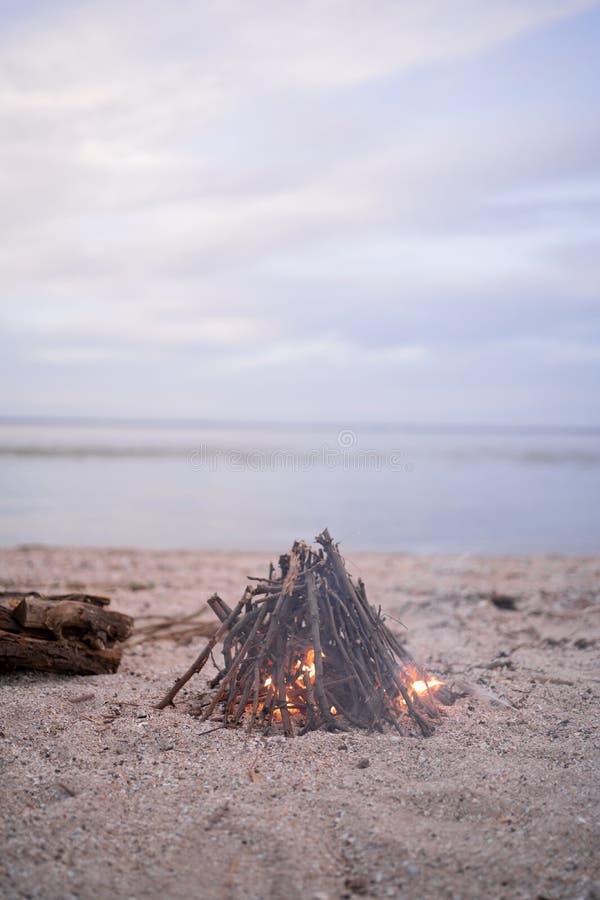 Bonfire on the Beach at Sunset. Fire on the Beach. Inviting Campfire on ...