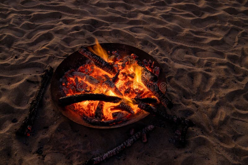 A Bonfire on the Beach during Sunset Stock Image - Image of wild ...