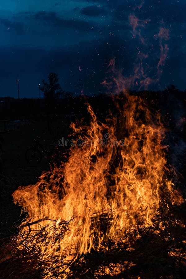 A Bonfire is Burning Outside at Night Stock Image - Image of fantastic ...