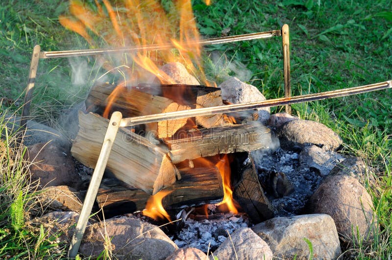 Bonfire between Two Stones at Camp in Summer Stock Image - Image of ...